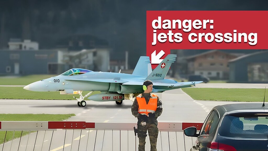 The Military Airfield with Two Public Roads Crossing the Runway ...